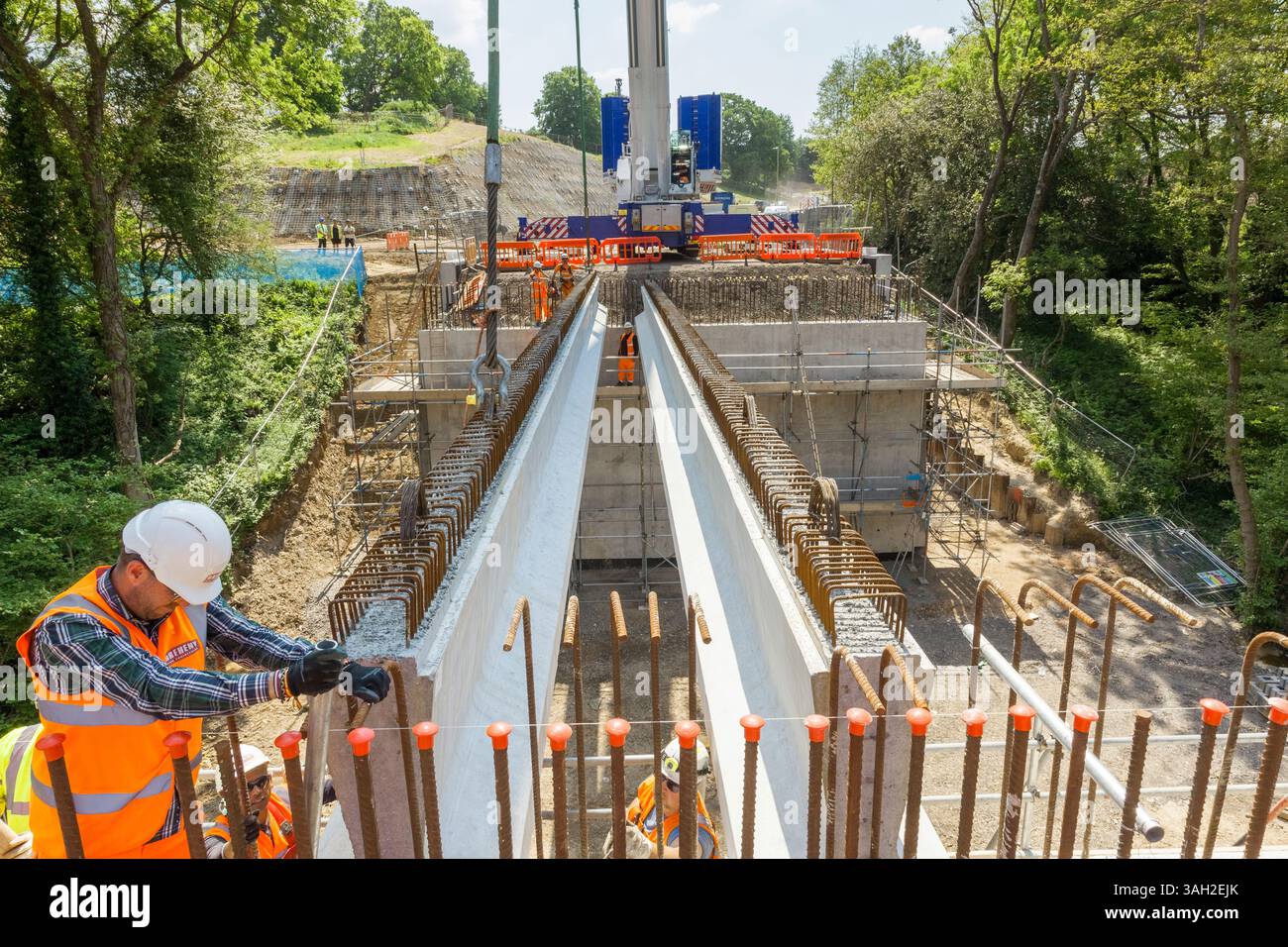 A heavy-lift Baldwins crane lifting concrete beams into place on a new ...