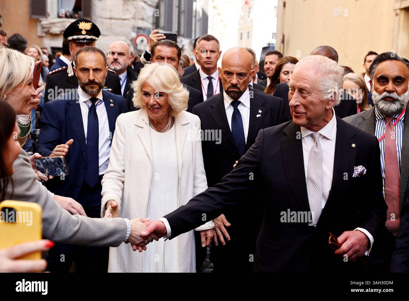 King Charles III and Queen Camilla are greeted outside the Italian ...