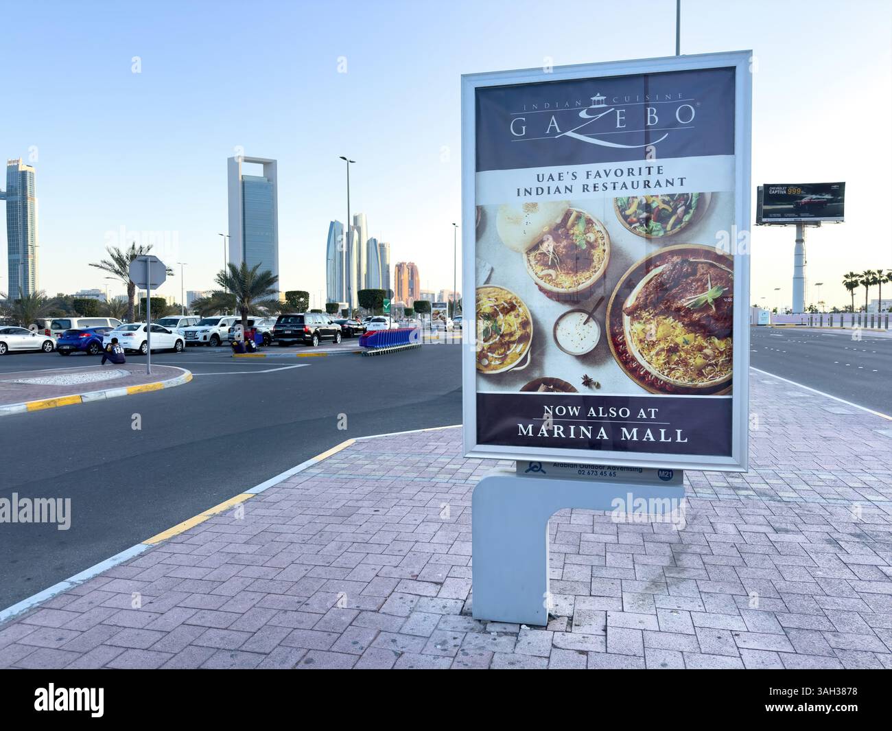 March 22, 2025. United Arab Emirates. Abu Dhabi. Advertising board at ...
