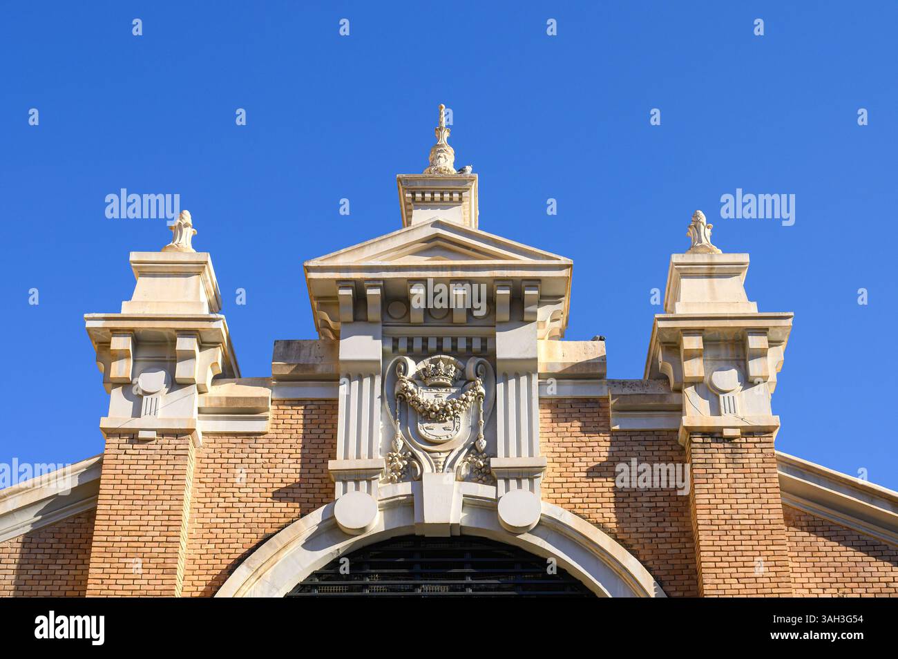 Architectural capital on the facade of the Veronicas Market building ...