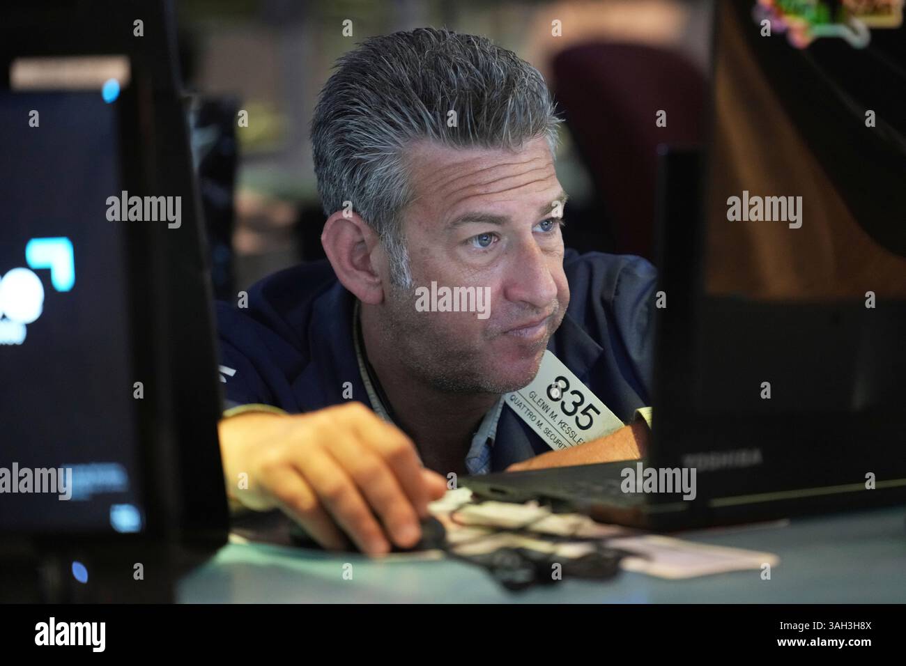 Glenn Kessler works on the floor at the New York Stock Exchange in New ...
