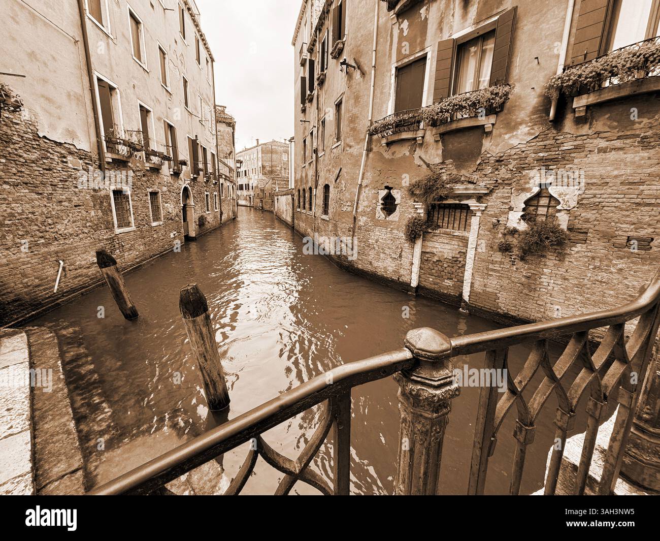 Tranquil scene in Venice, Italy. Canals and brick buildings Stock Photo ...