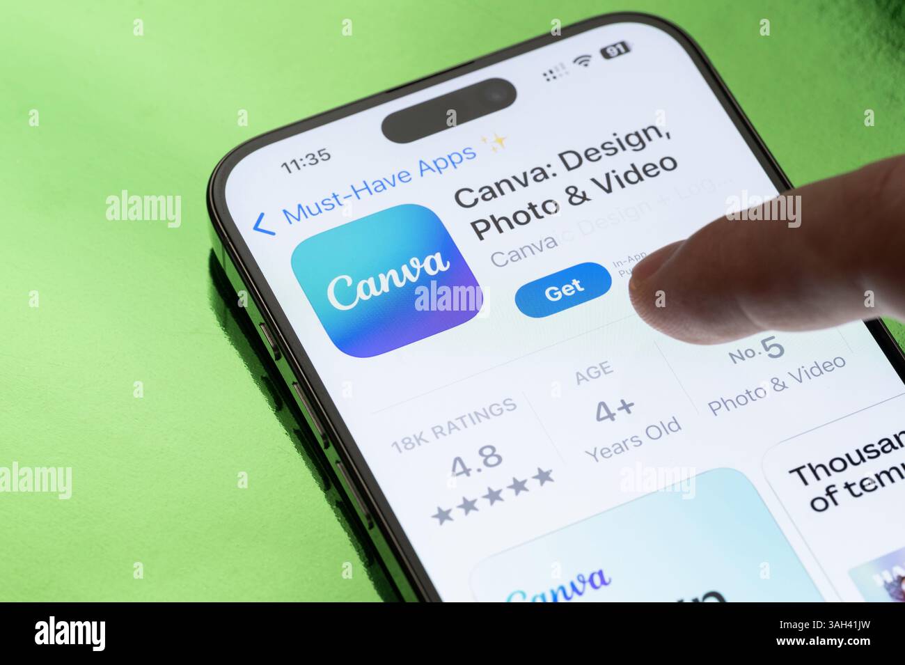 New York, USA - March 30, 2025: Opening canva app on smartphone screen ...
