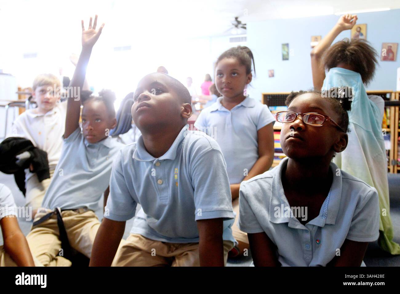 Listening teacher in times hi-res stock photography and images - Alamy