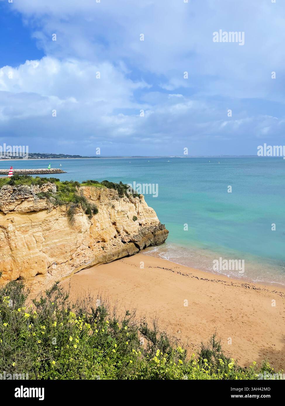Above view to a beautiful desert beach with blue and green sea water an ...