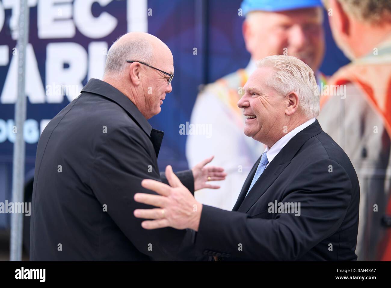 Ontario PC Leader Doug Ford, right, is greeted MP Rob Flack during a ...