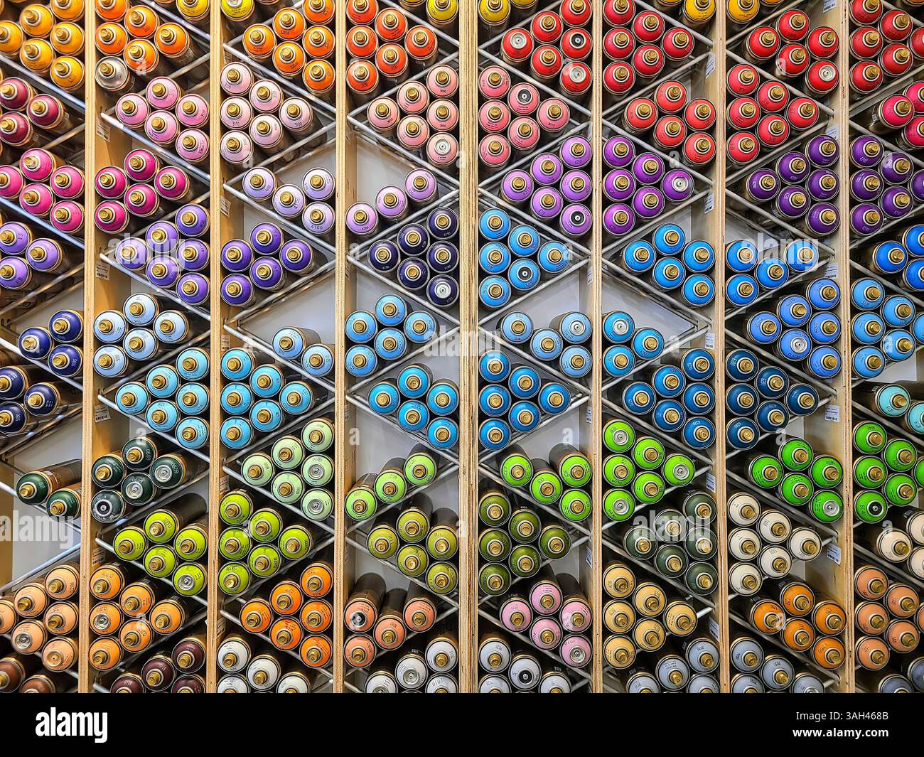 Vibrant Spray Paint Display in Art Store Eye-Level View Stock Photo - Alamy
