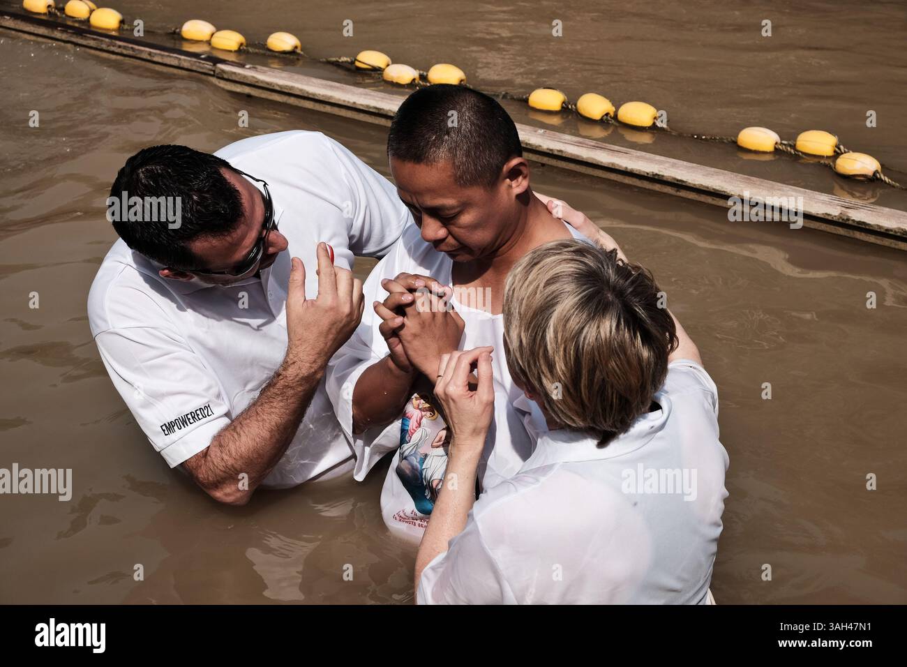 May 23, 2015 - Israel - Devote Christians are baptized in the Jordan ...