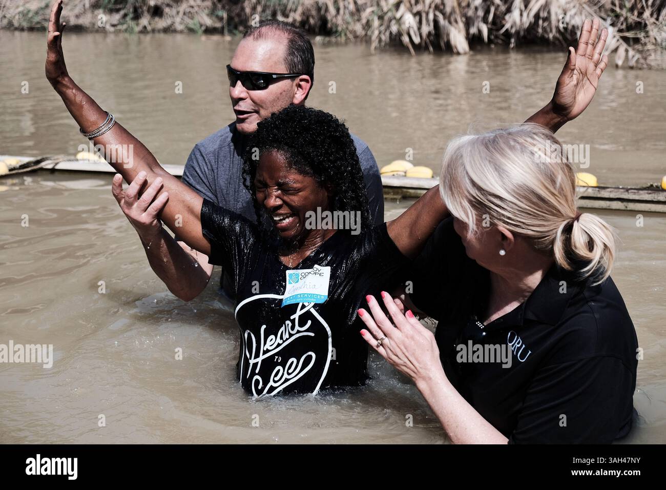 May 23, 2015 - Israel - Devote Christians are baptized in the Jordan ...