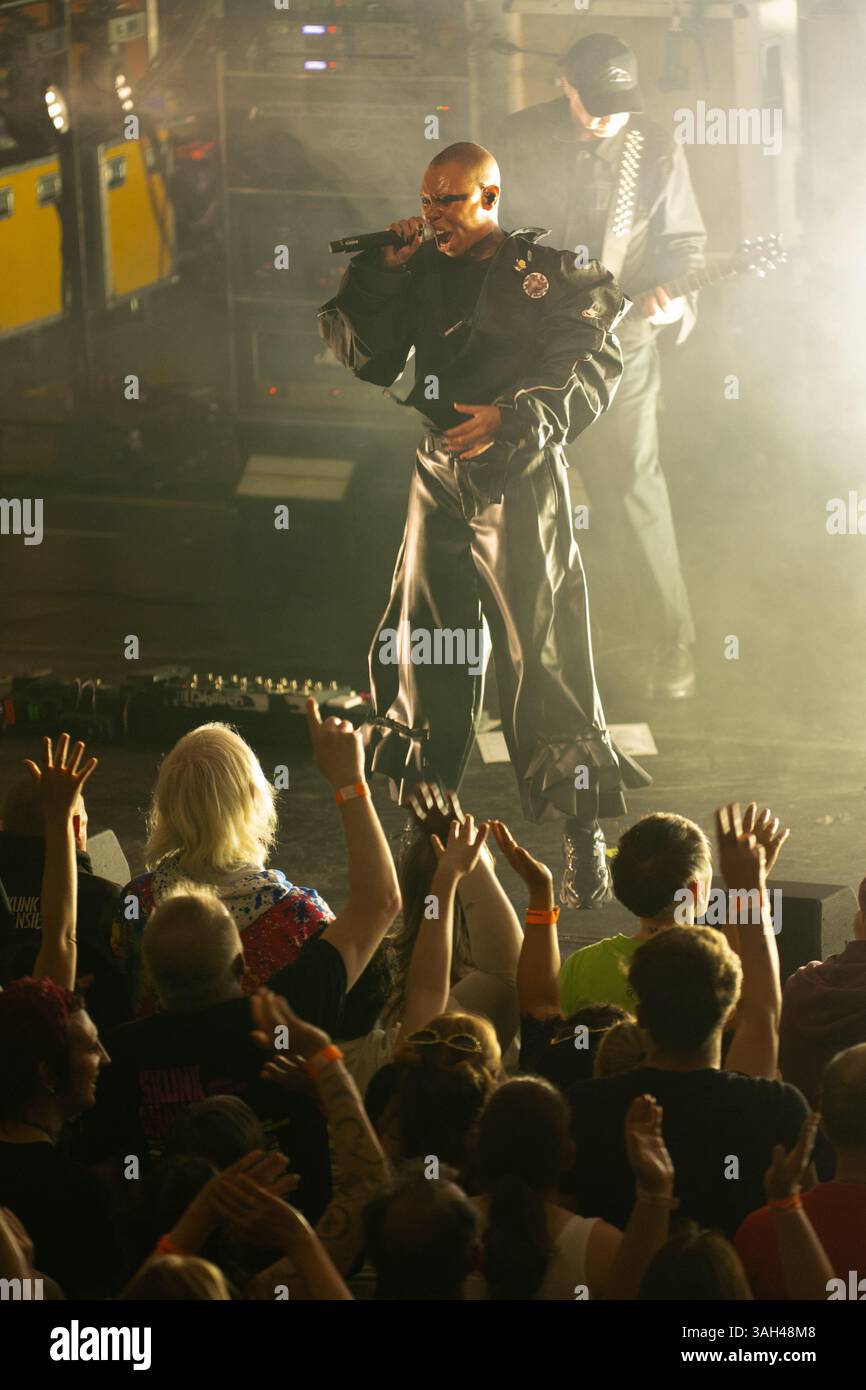 Cambridge, UK, 8 April, 2025. Skunk Anansie in concert. Pictured left ...