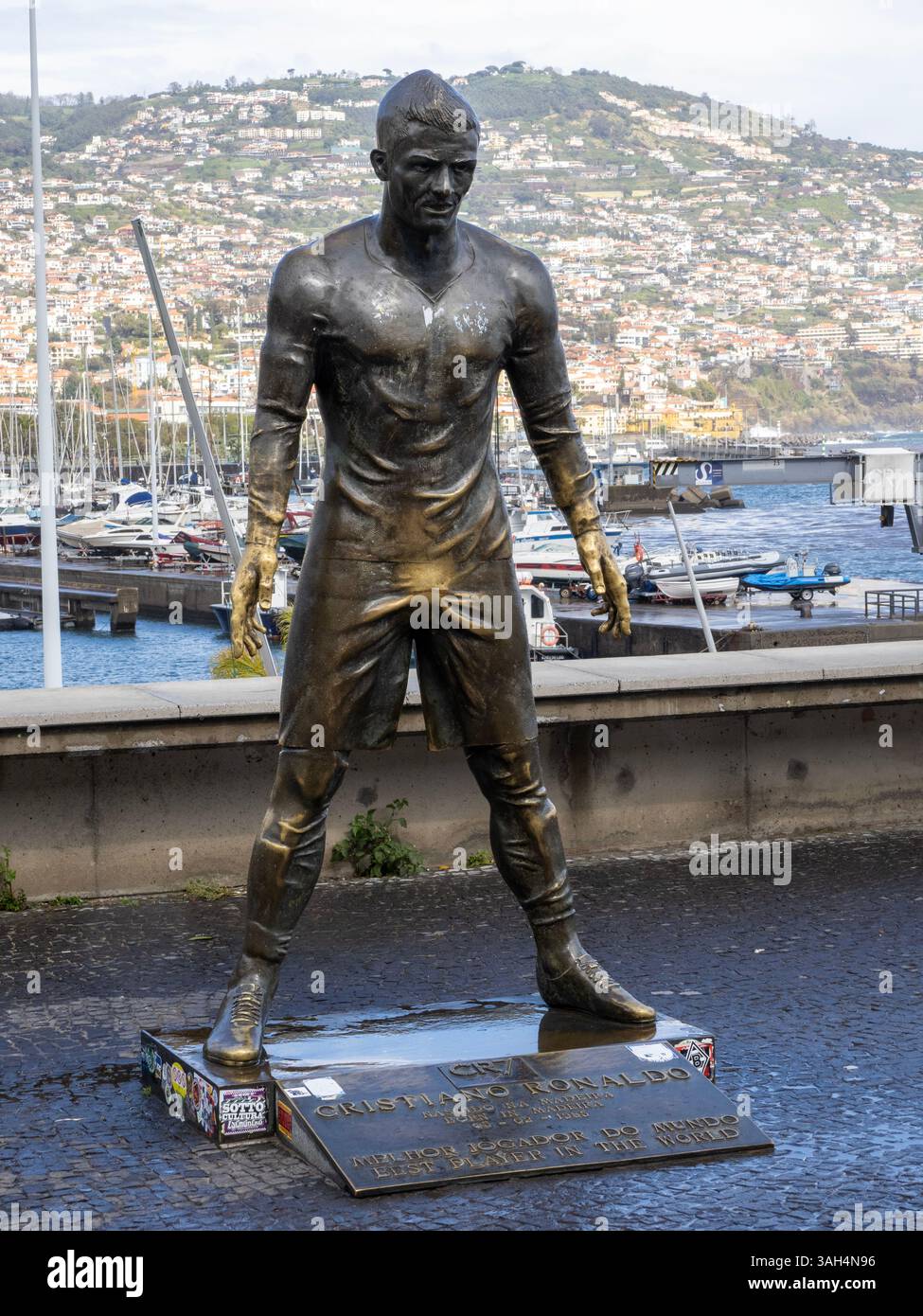 A sculpture of Cristiano Ronaldo outside t he Cristiano Ronaldo museum ...