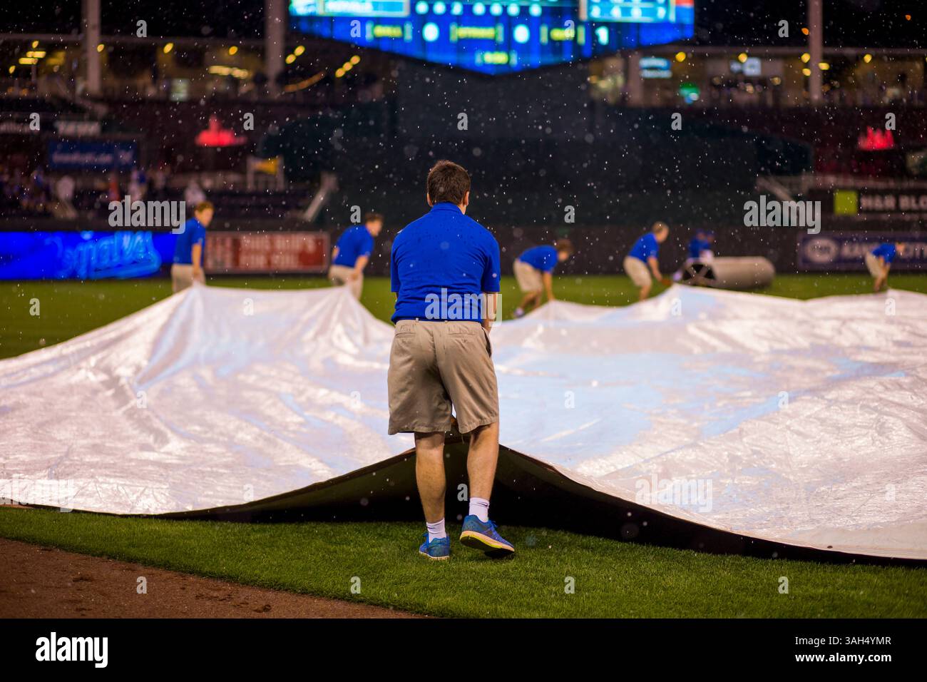 June 04, 2015: The Kansas City Royals grounds crew lays down the tap in ...