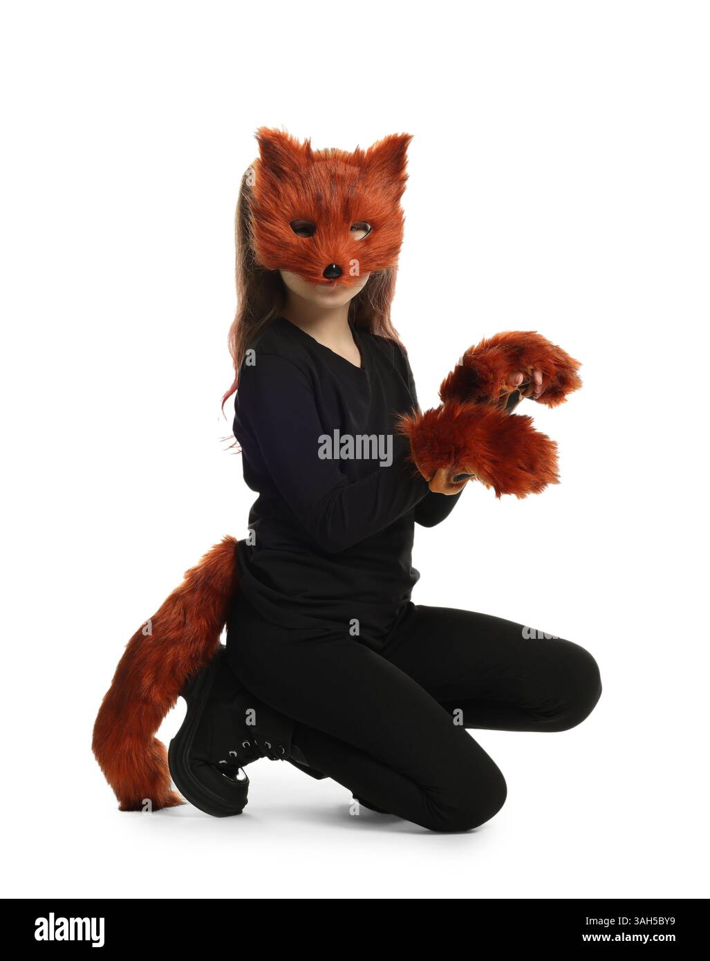 Quadrobics. Girl wearing fox mask, tail and gloves on white background ...