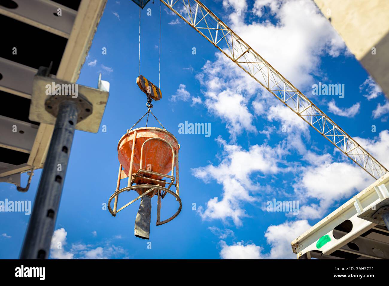 Crane is carry cone tank, conical metal bucket to transport and deliver ...