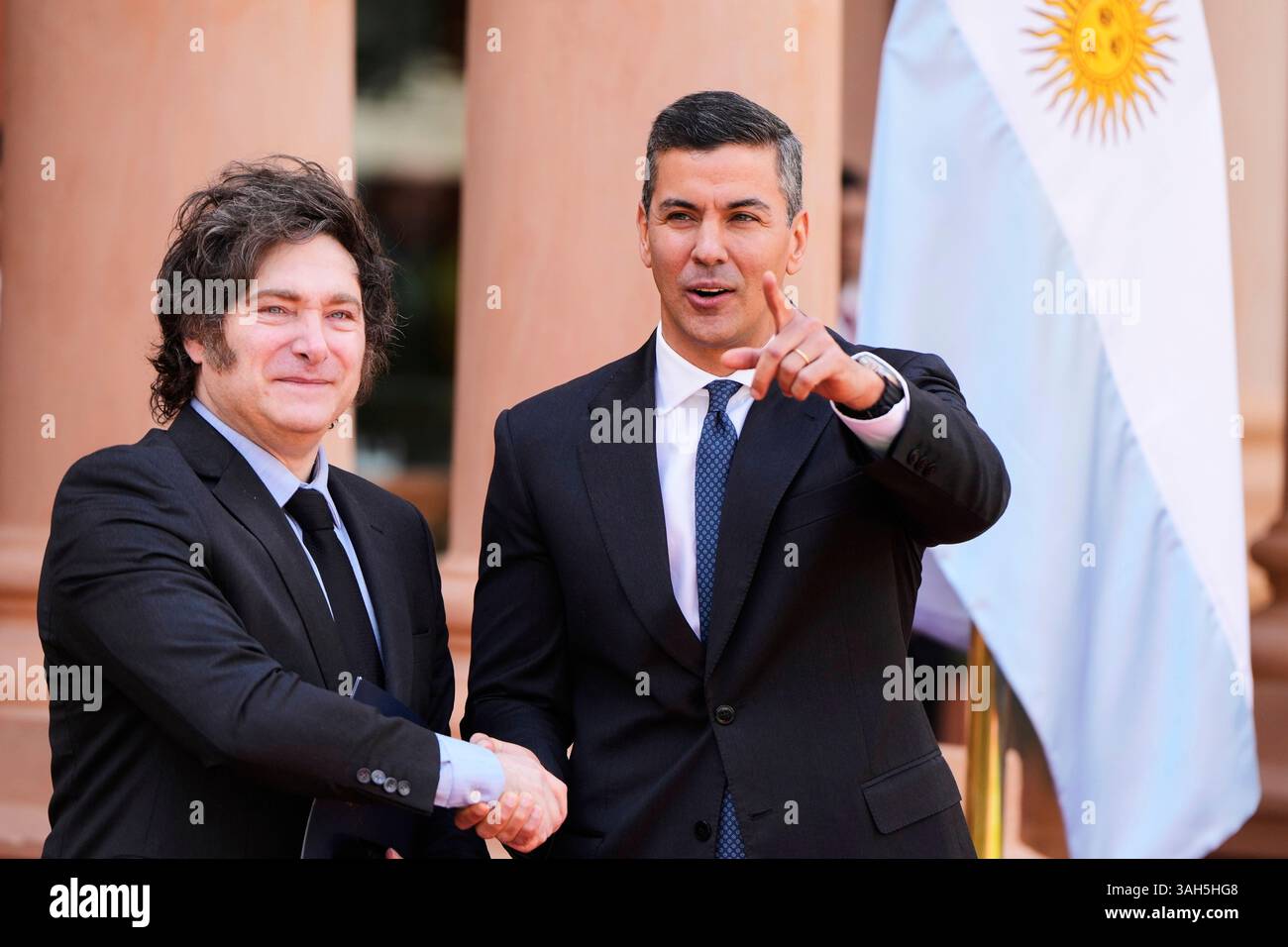 Paraguayan President Santiago Pena, right, poses for photos with ...