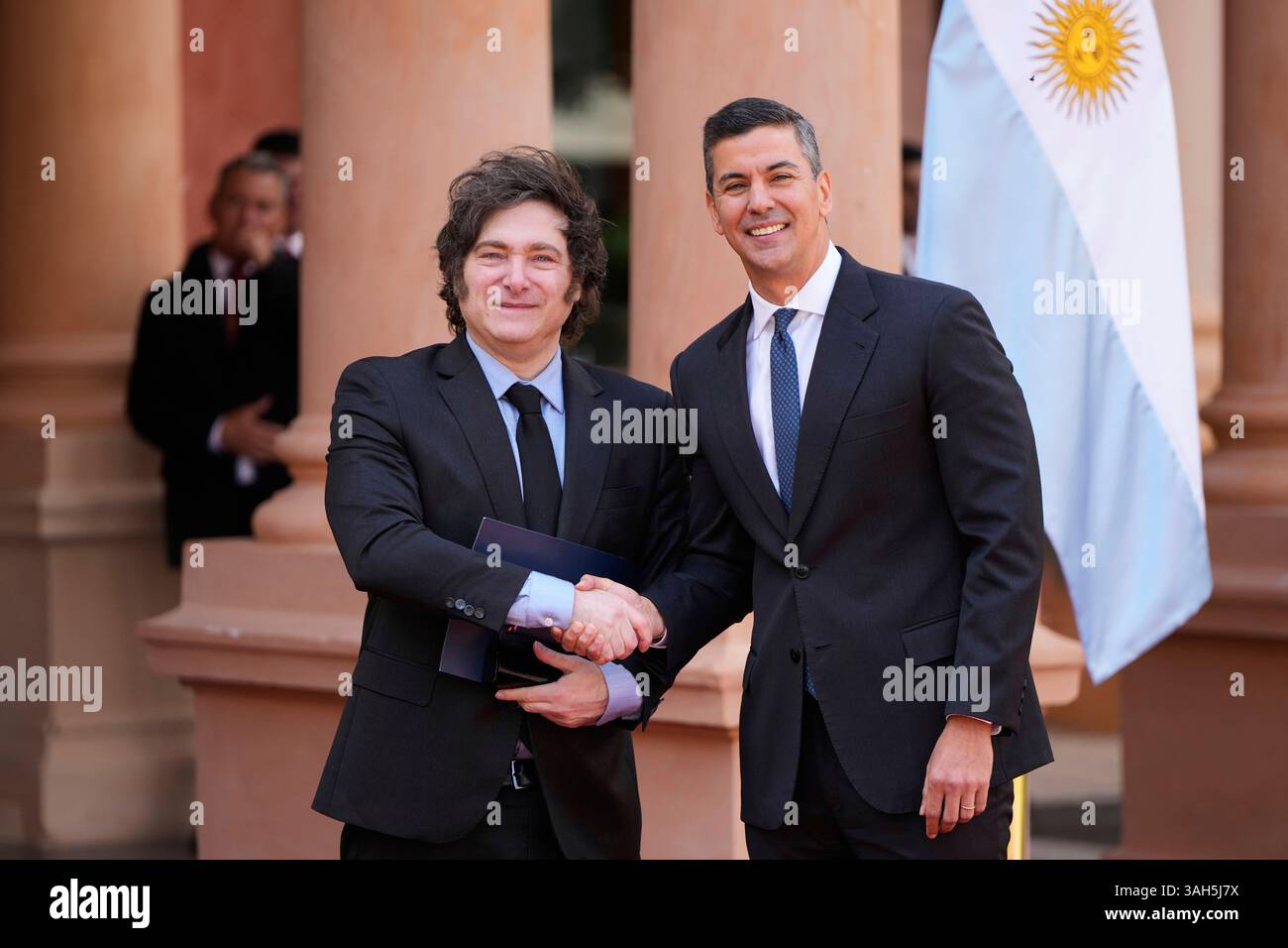 Paraguayan President Santiago Pena, right, poses for photos with ...