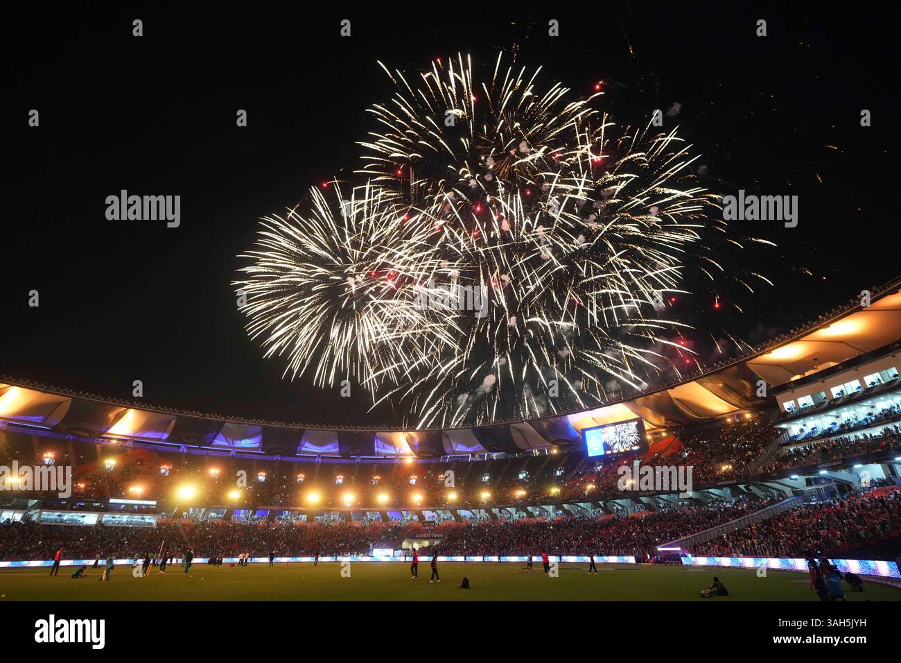 Pyrotechnics illuminate over the Narendra Modi Stadium during the ...