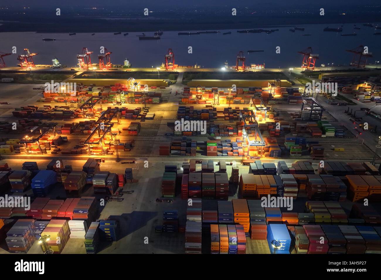 NANJING, CHINA - APRIL 8, 2025 - Containers are stacked at the Longtan ...