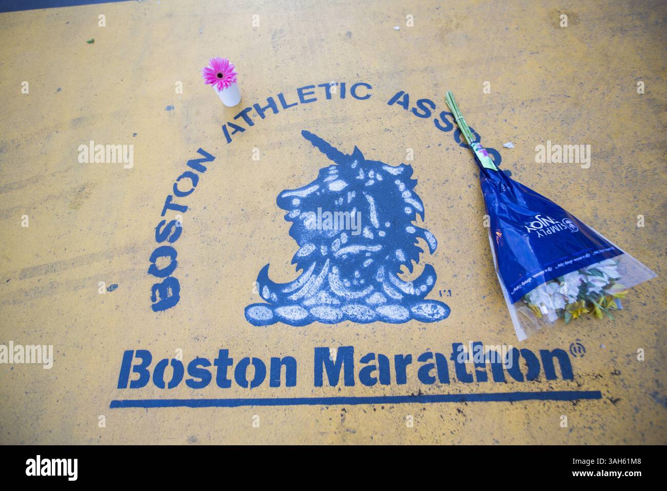 May 15, 2015 - Boston, Massachusetts, U.S. - Flowers lay at the Boston ...