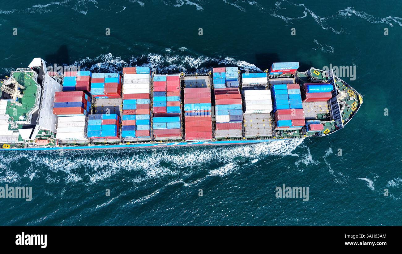 QINGDAO, CHINA - APRIL 9, 2025 - A cargo ship loaded with foreign trade ...