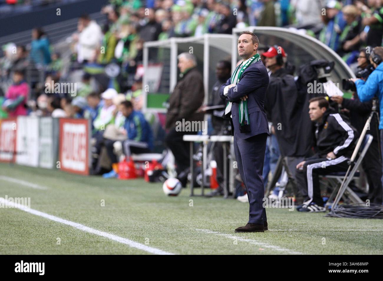 Portland Timbers head coach Caleb Porter looks at the the clock as time ...