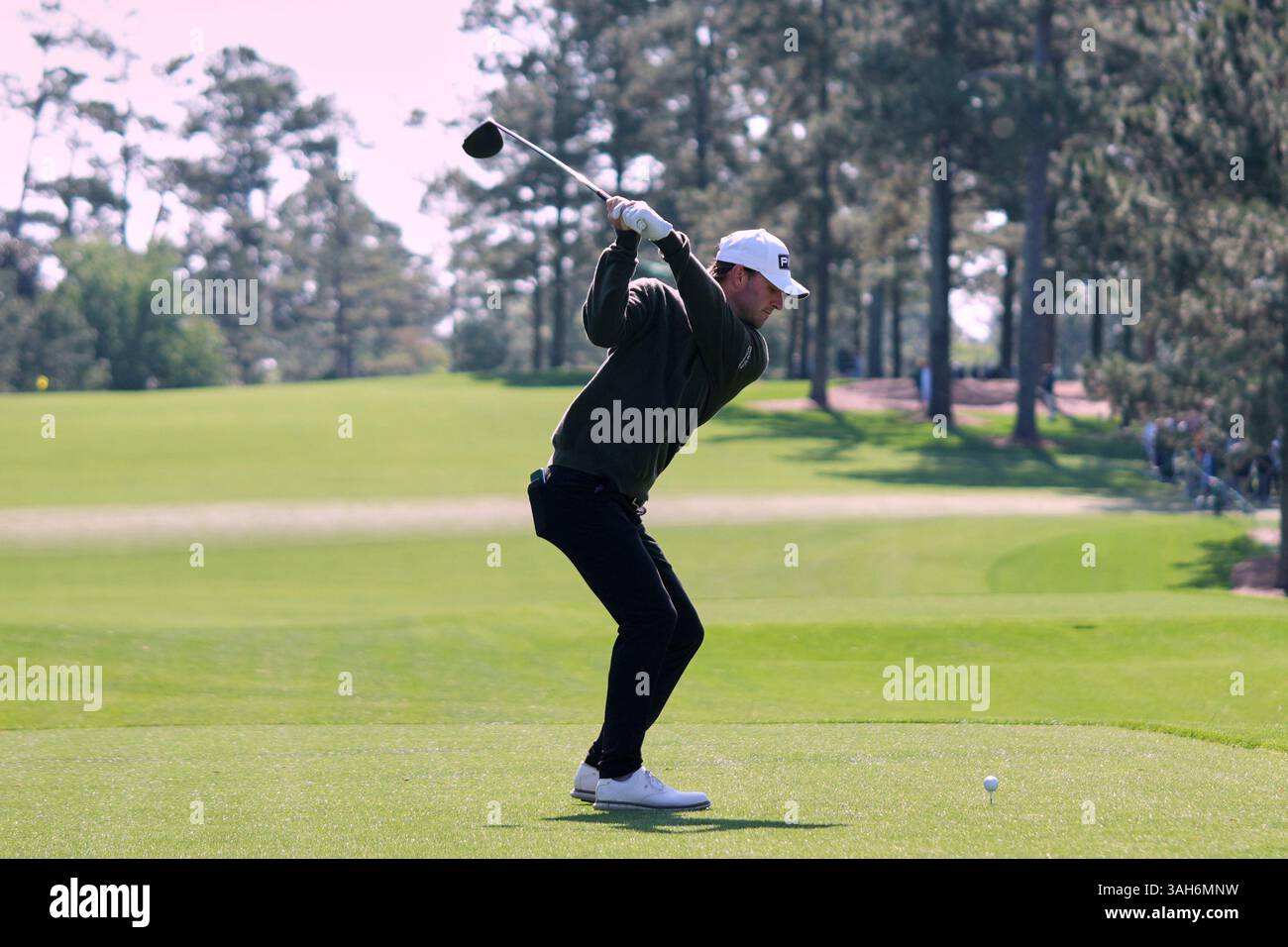 Austin Eckroat hits his tee shot on the 17th hole during a practice ...