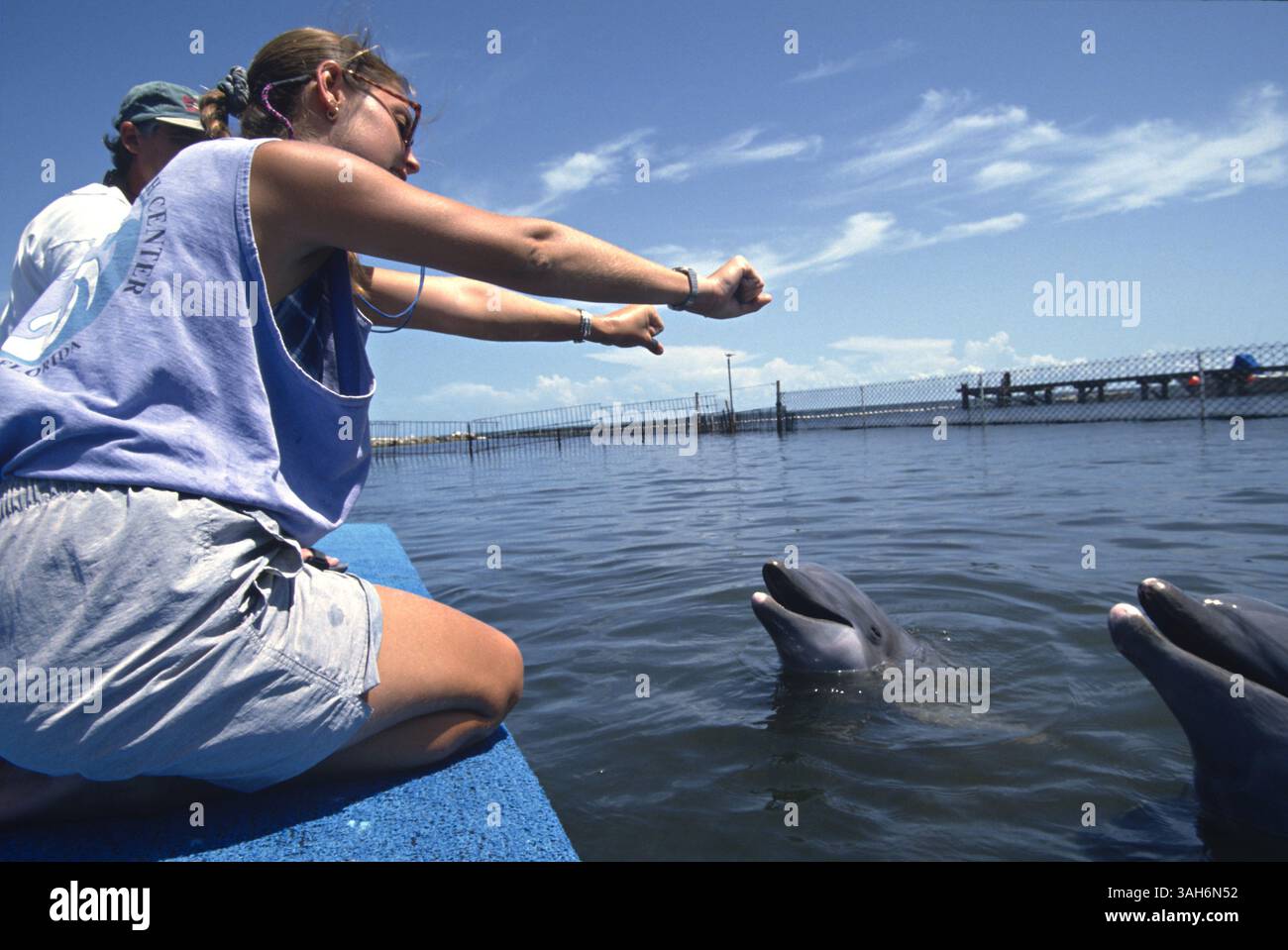June 27, 1996 - Marathon Key, FL, United States of America - A trainer ...