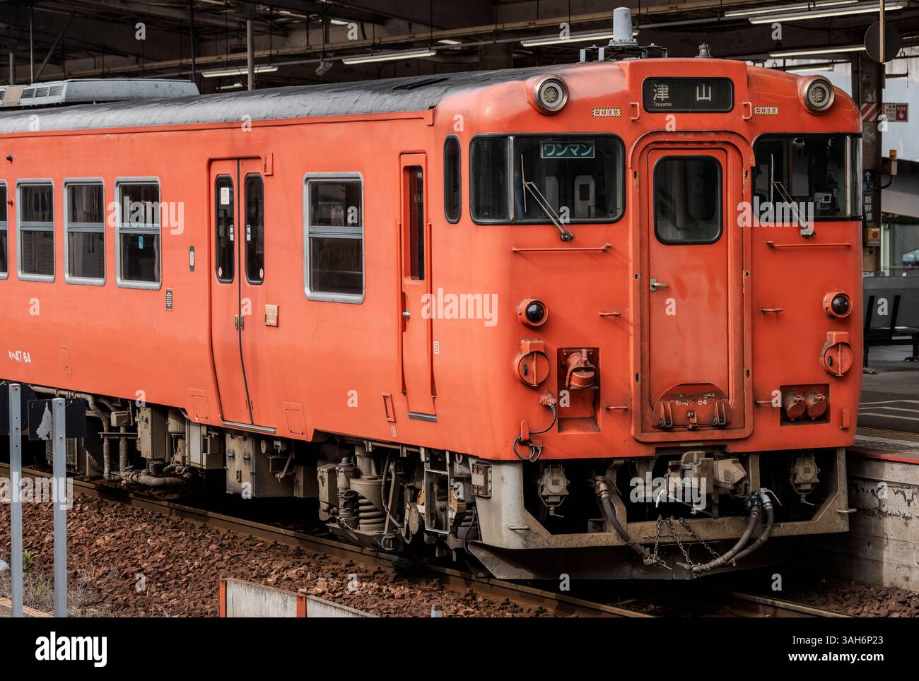A JR West KiHa 47 Series train on the Tsuyama Line at Okayama Station ...