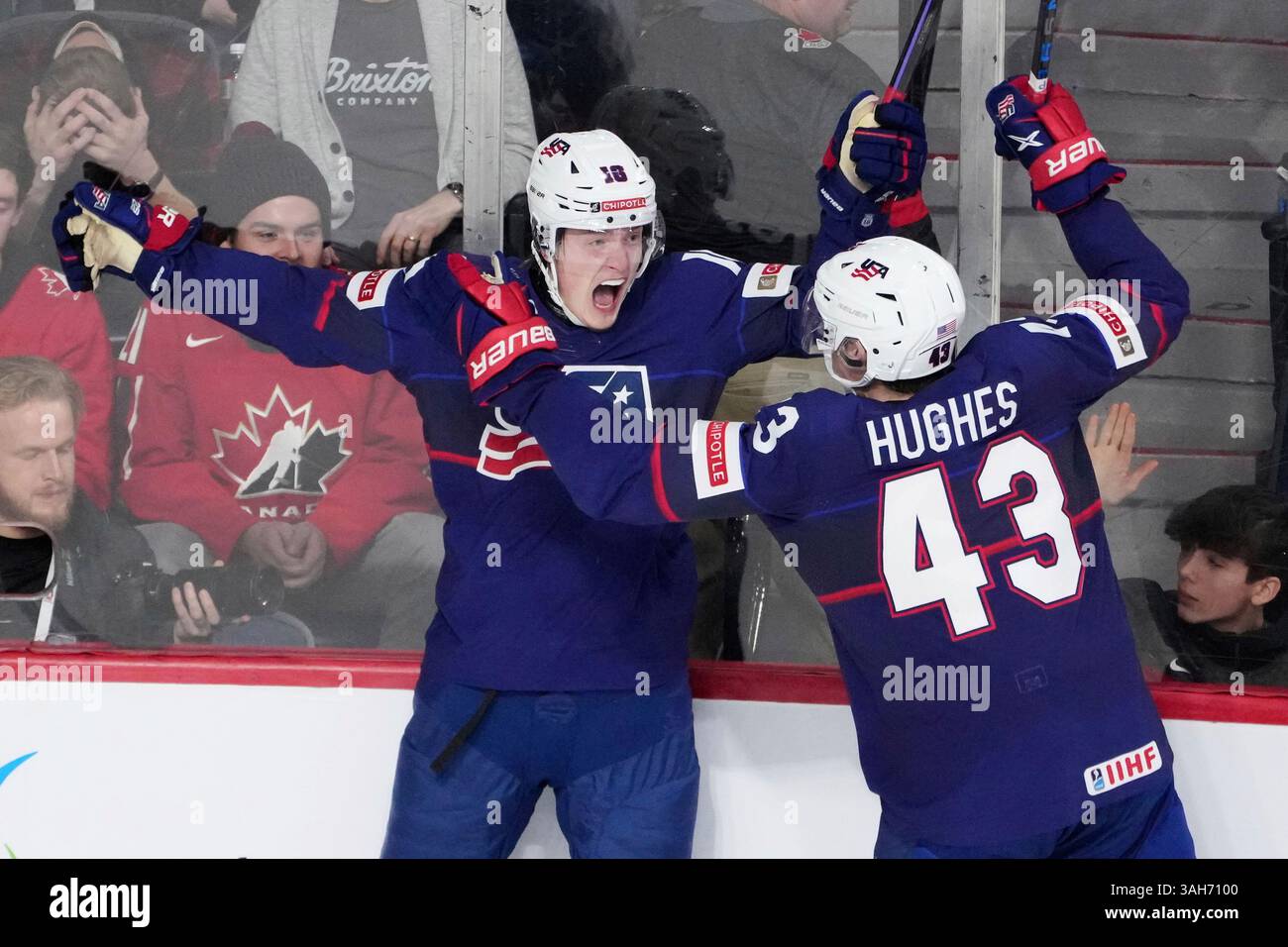 FILE - United States' Chaz Lucius , left, celebrates after scoring the ...