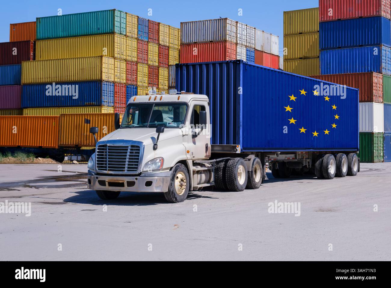 An EU-marked shipping container on a truck, illustrating European international trade - Montage ...