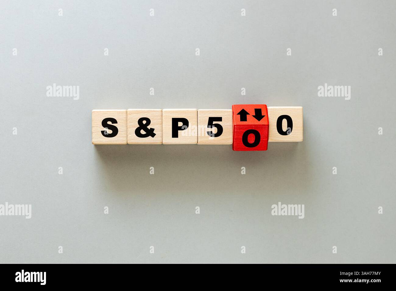 S&P 500 index symbol. Wooden blocks with an arrows that symbolizes that ...