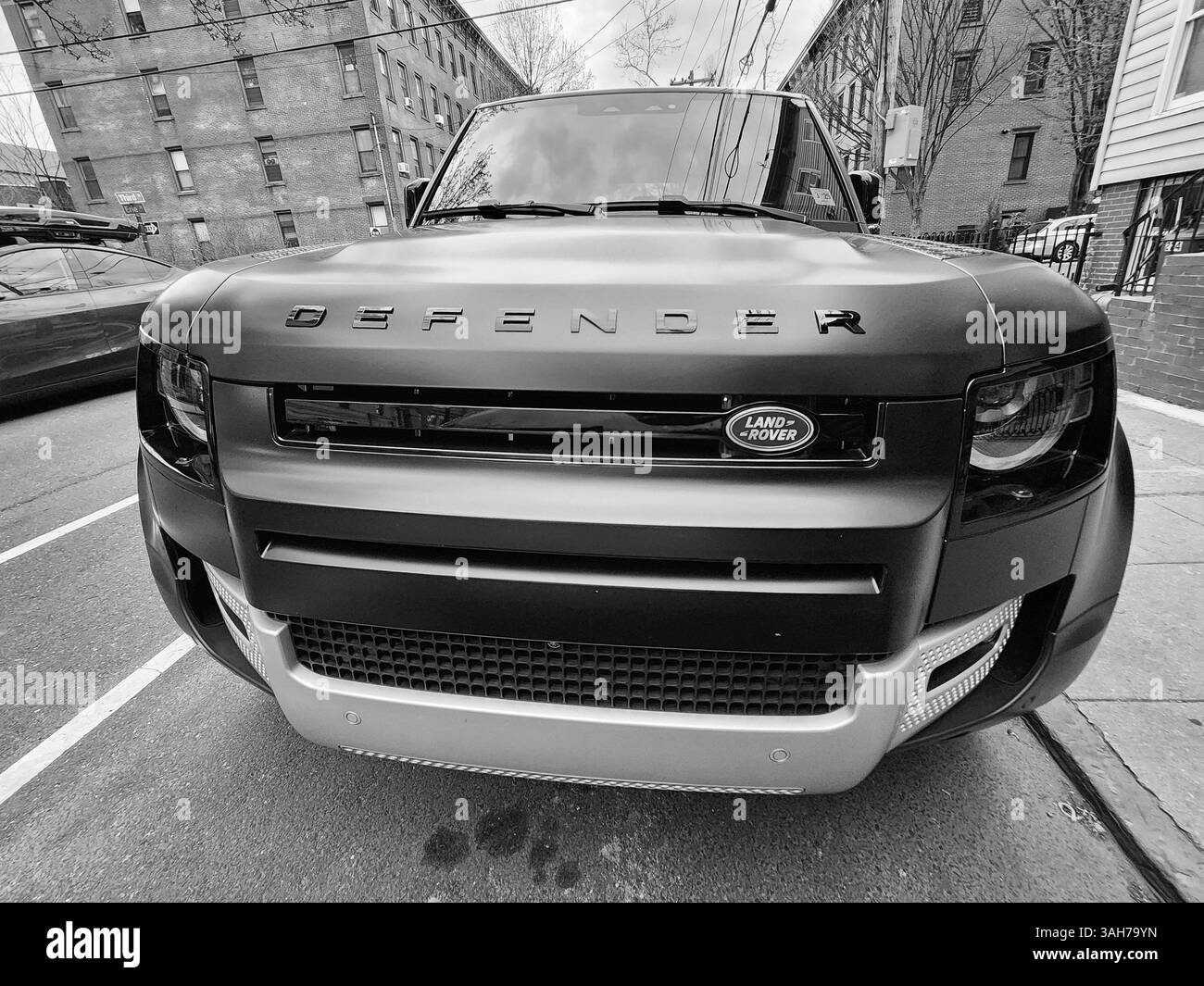New York City, USA - March 18, 2024: Land Rover Defender matte black ...