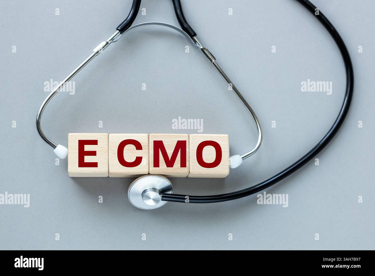 ECMO (Extracorporeal Membrane Oxygenation) written on wooden block with ...