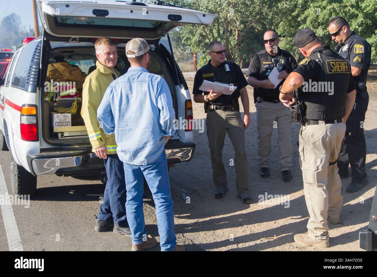 June 18, 2015 - CA, USA - Salida Fire Chief Dale Skiles talks with ...