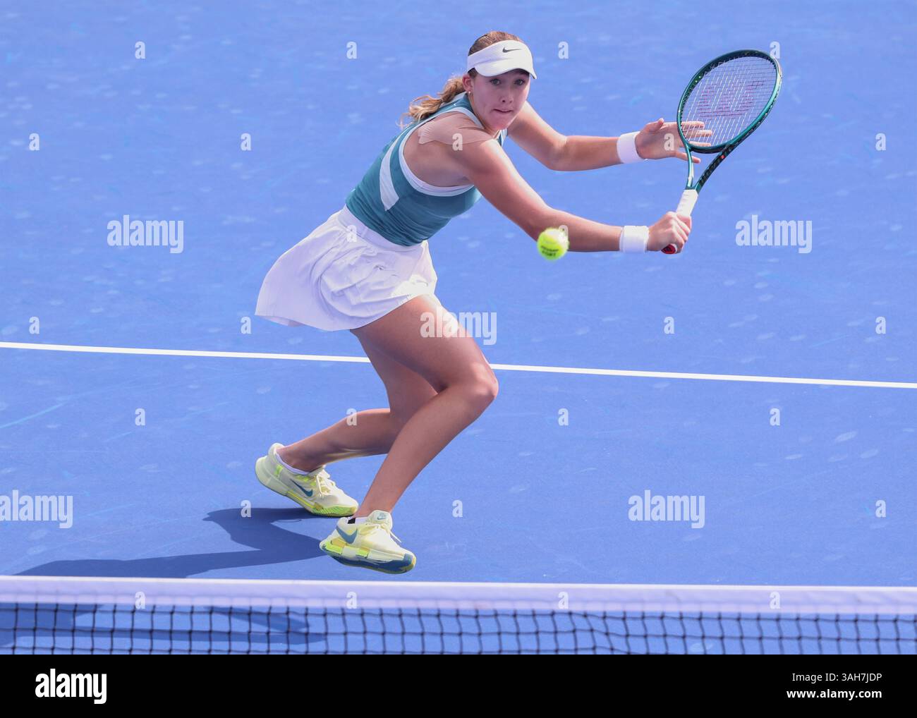 Russian tennis player Mirra Andreeva playing a backhand volley at the ...