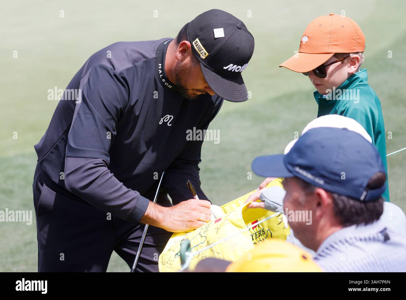 Augusta, United States. 09th Apr, 2025. Jason Day of Australia signs ...