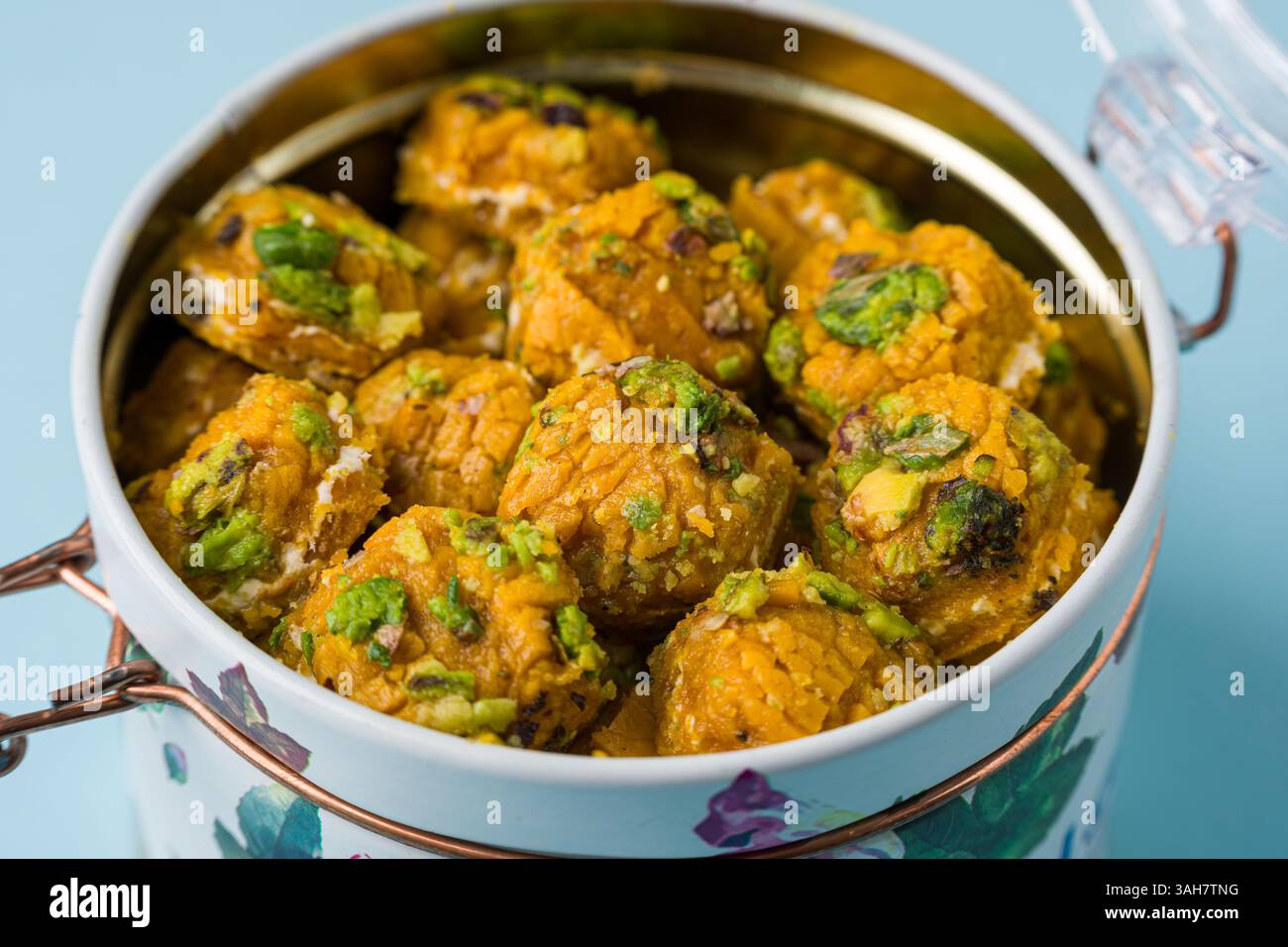 Sohan Dessert, the traditional famous Iranian dessert on a blue ...
