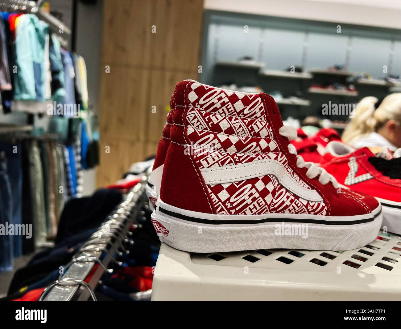 Kyiv, Ukraine - April 08, 2025: Stylish red high-top Vans shoes with ...
