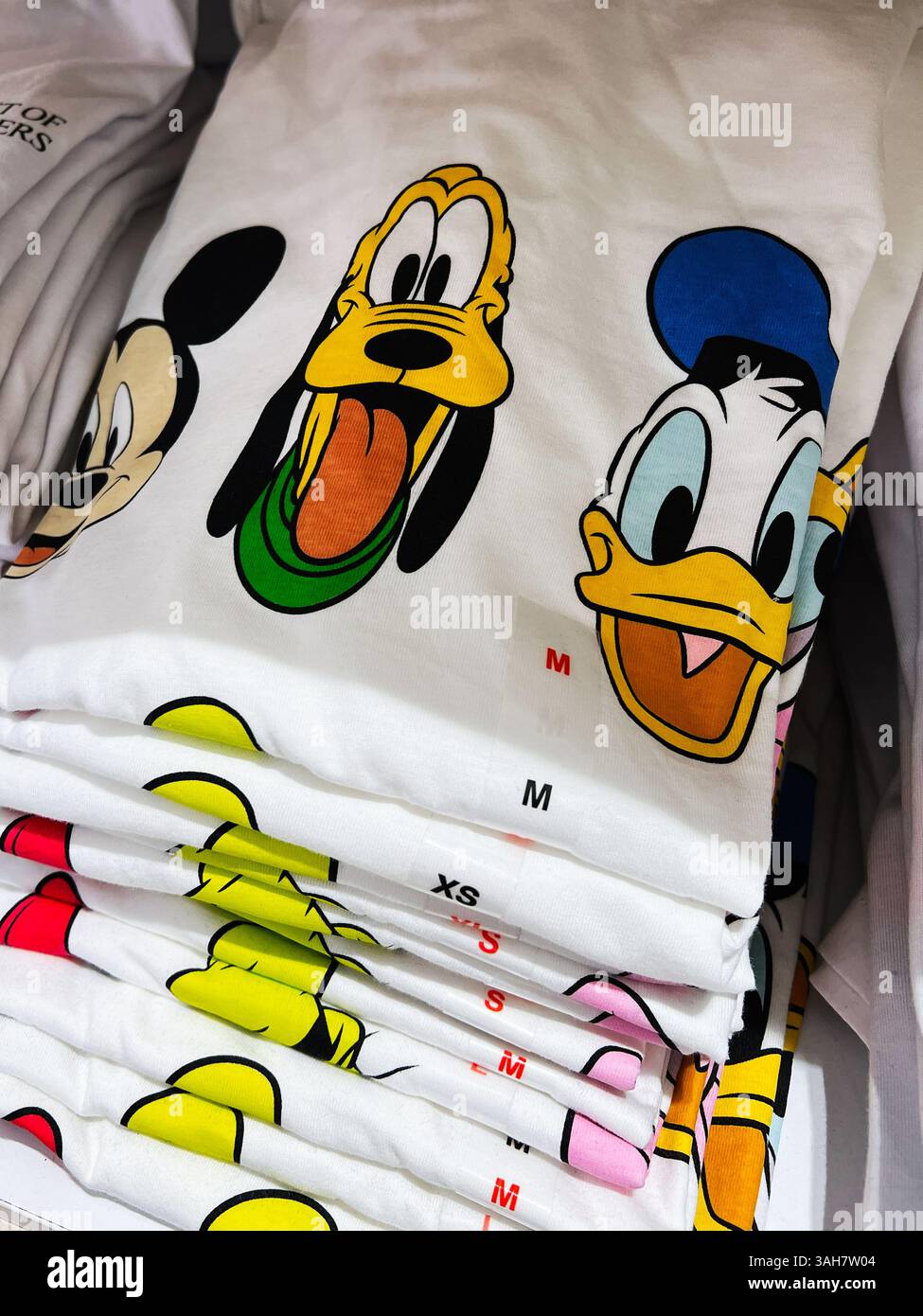 Kyiv, Ukraine - April 08, 2025: Folded white t-shirts featuring ...