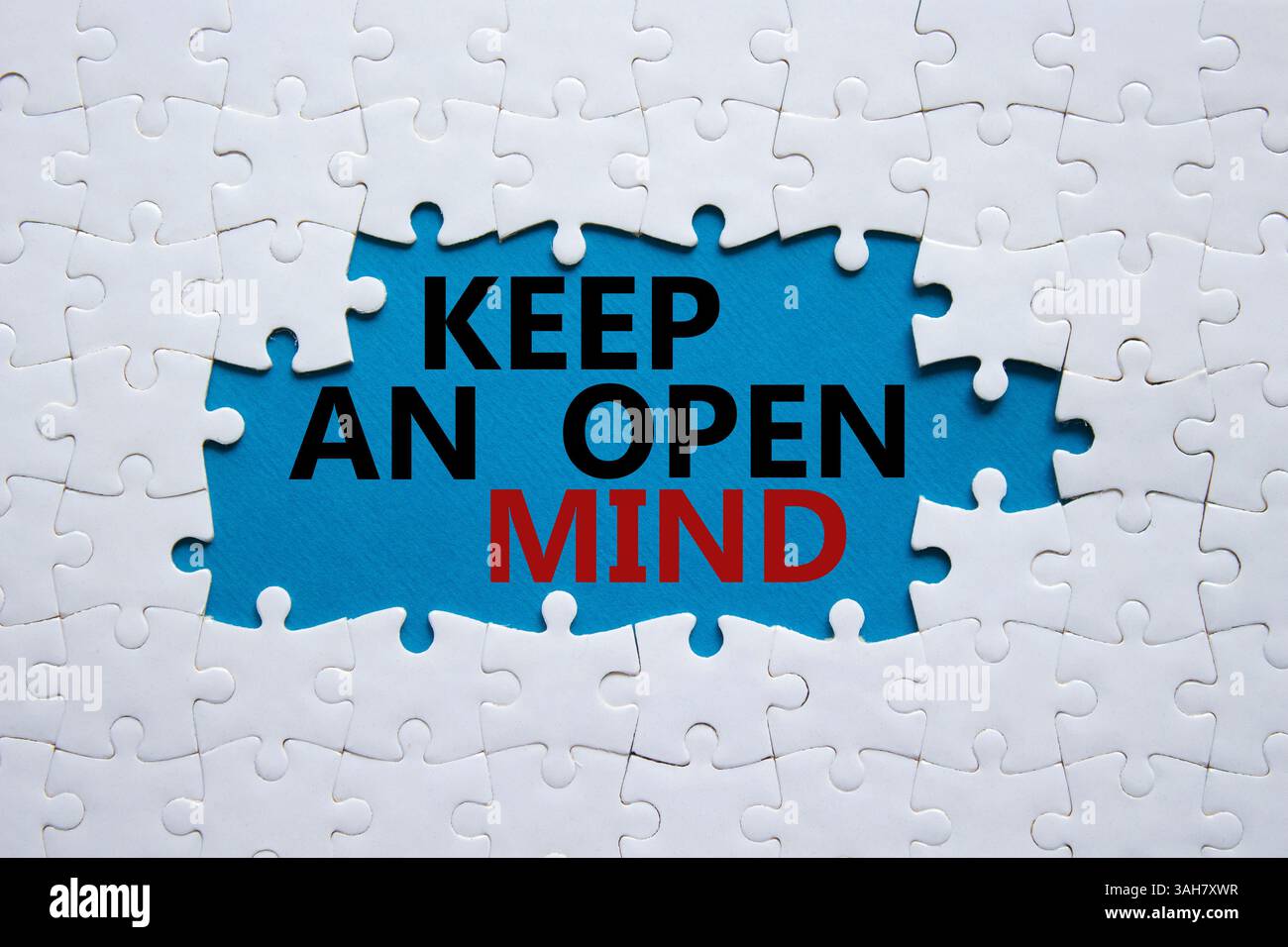 Keep an open mind symbol. White puzzle with words Keep an open mind ...