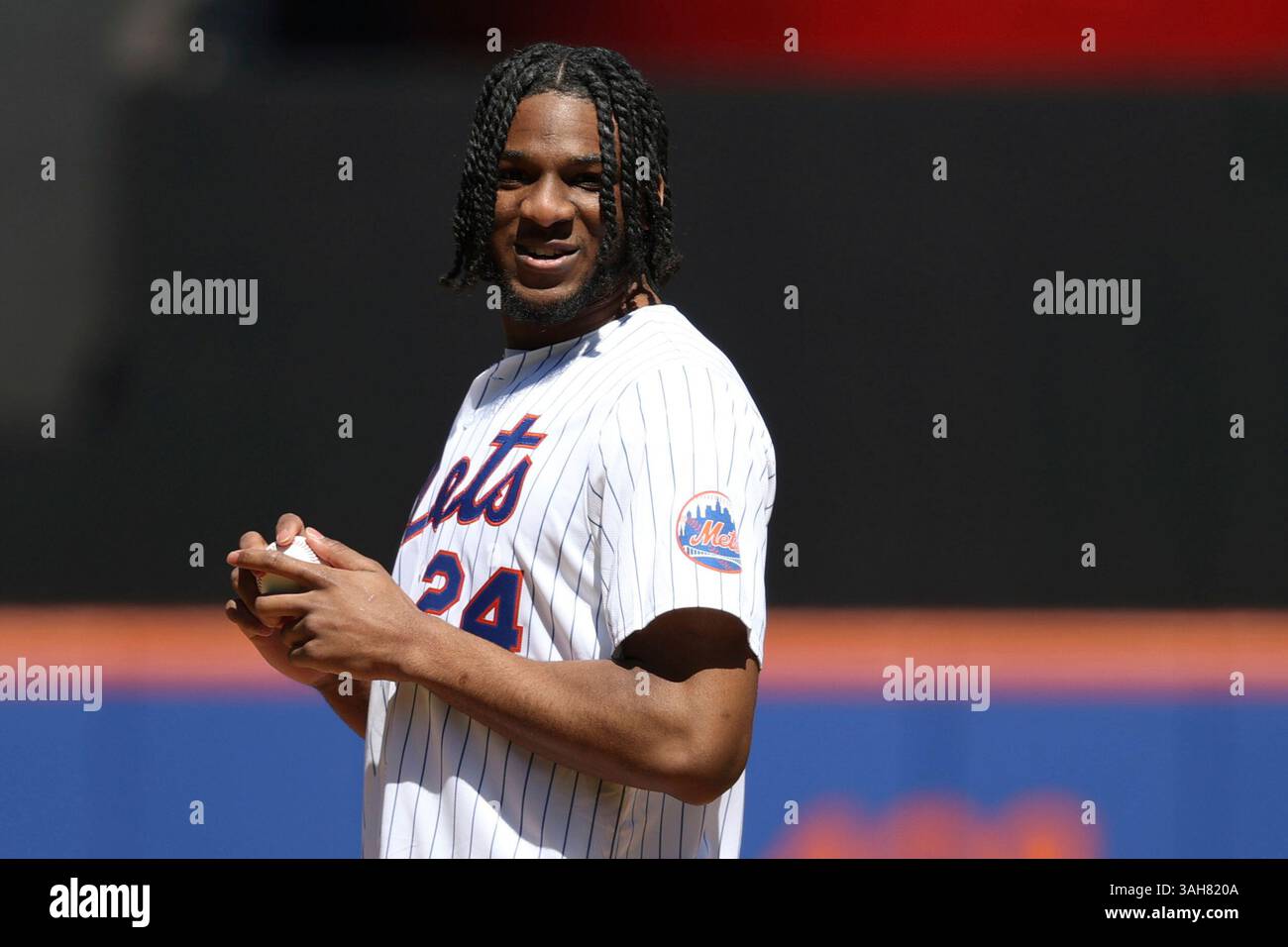 St. John's men's basketball player Zuby Ejiofor gets set to throw out a ...