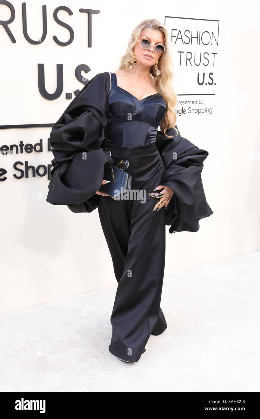 April 8, 2025 Los Angeles, California ,USA: FERGIE attends the Fashion ...