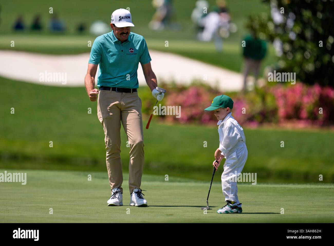 Keegan Bradley celebrates after his son Cooper, 4, made a putt on the ...