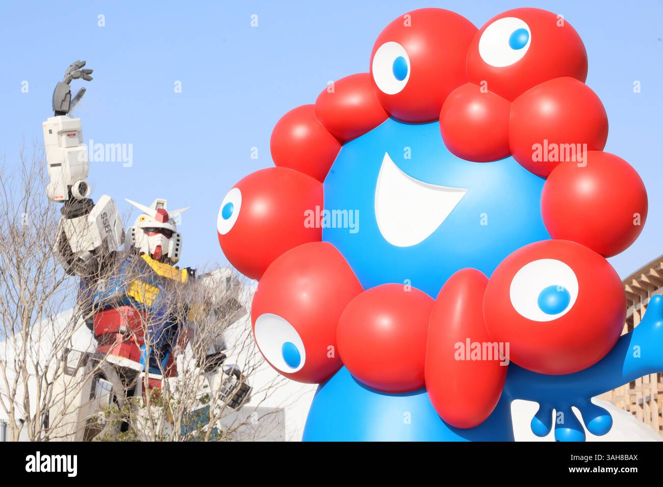 Osaka, Japan. 9th Apr, 2025. A 17-meter tall Gundam robot statue is ...