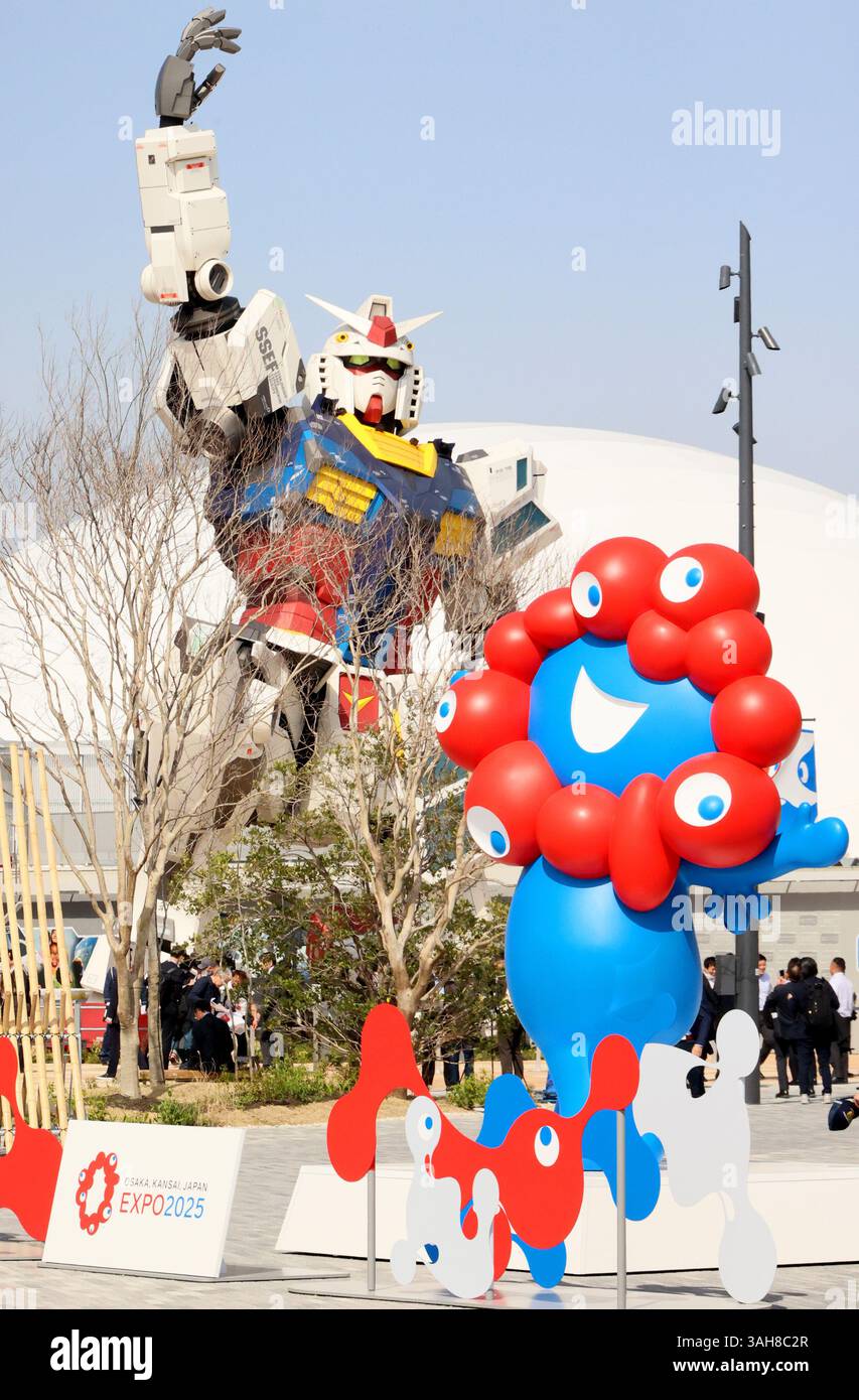 Osaka, Japan. 9th Apr, 2025. A 17-meter tall Gundam robot statue is ...