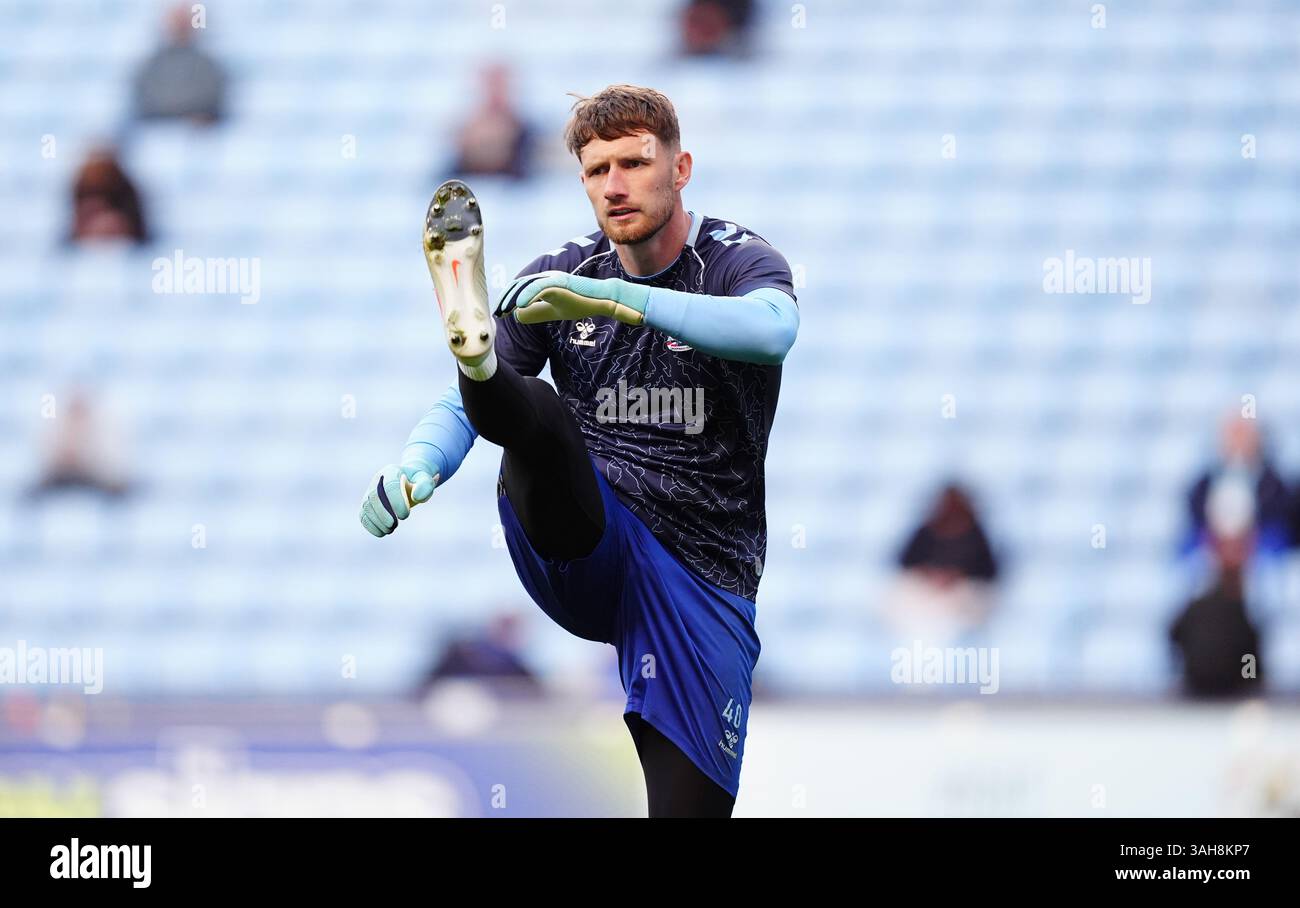 Coventry City goalkeeper Bradley Collins warming up before the Sky Bet ...