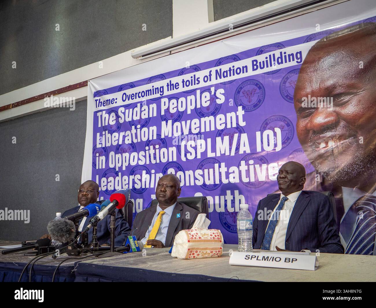 South Sudan's minister of Peace building, Stephen Par Kuol, centre ...