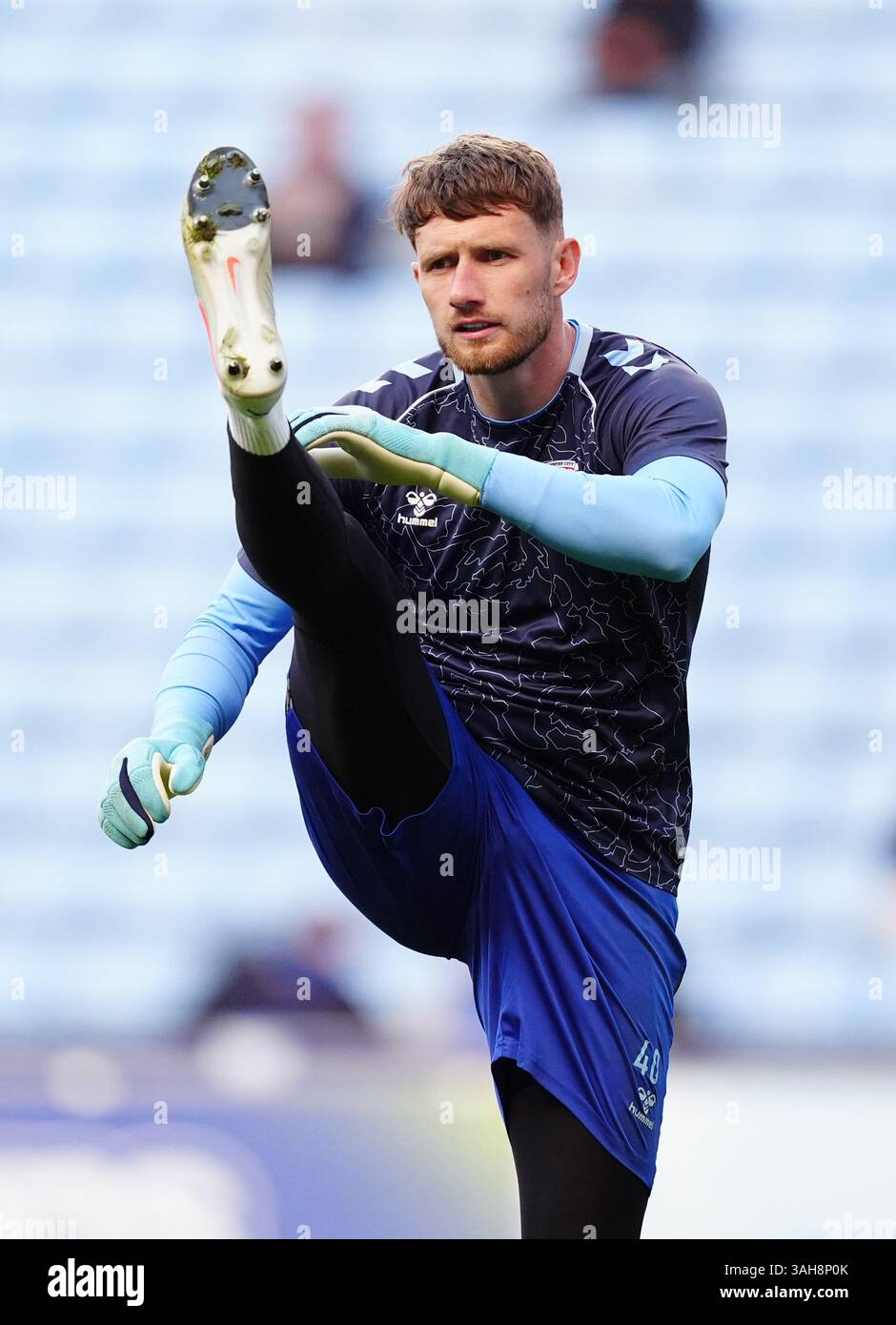 Coventry City goalkeeper Bradley Collins warming up before the Sky Bet ...