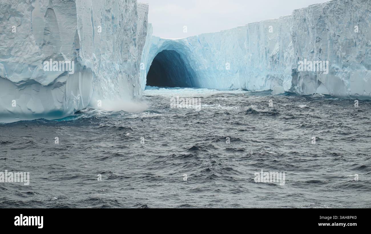 A Cave on the side of a very large tabular Iceberg named A23B ( a ...