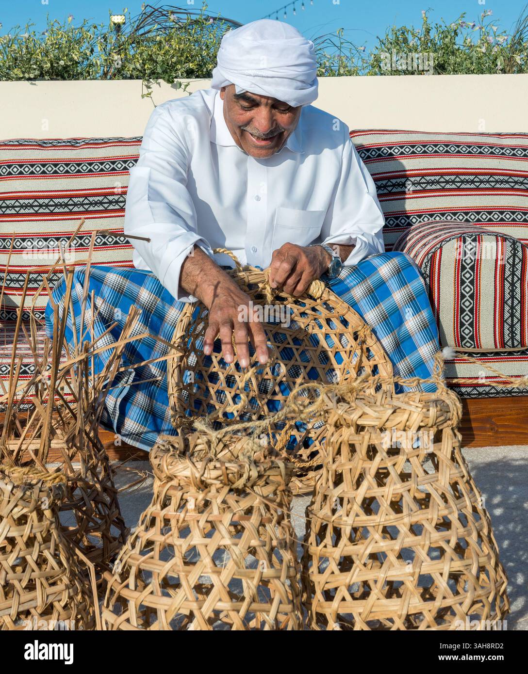 FIRST FISHING EXHIBITION IN QATAR A Qatari man display their skills on ...